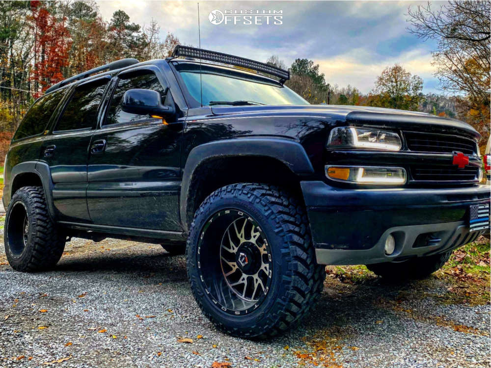 2004 Chevrolet Tahoe with 20x12 -44 TIS 544MB and 33/12.5R20 Nitto ...