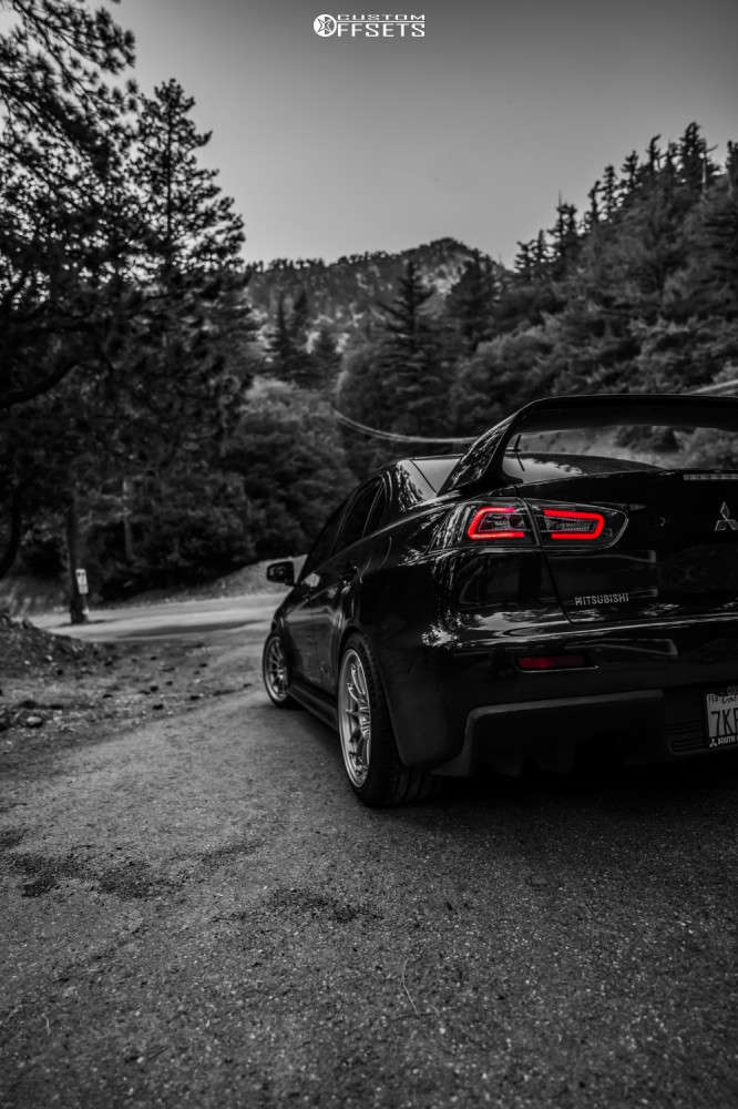 2015 Mitsubishi Lancer with 18x10.5 30 Enkei Nt03m and 275/35R18 ...