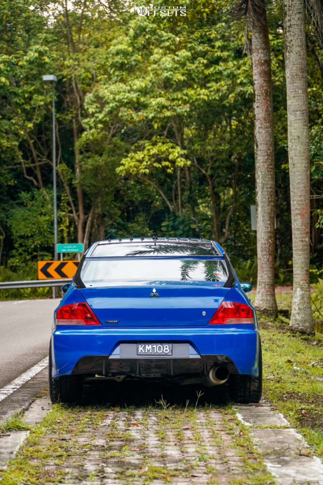 2002 Mitsubishi Lancer with 18x9.5 22 Rays Engineering Te37 and 245 ...