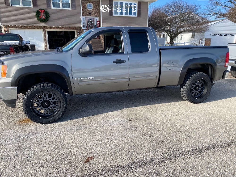 2009 GMC Sierra 1500 with 20x10 -25 Vision Rocker and 33/12.5R20 ...