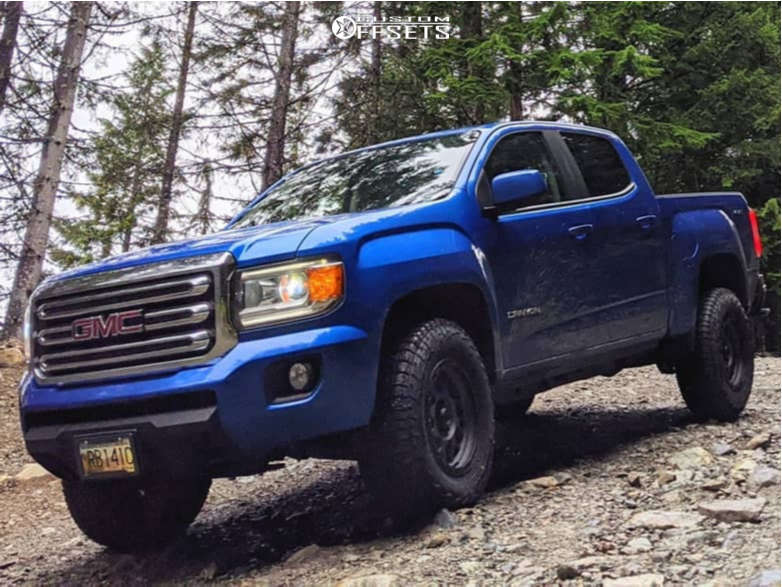 2018 GMC Canyon with 17x9 18 KMC Km535 and 32/10.5R17 Falken Wildpeak ...