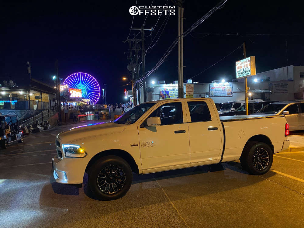 2017 Ram 1500 with 20x10 -18 Fuel Warrior and 32/12.5R20 Ohtsu At4000 ...