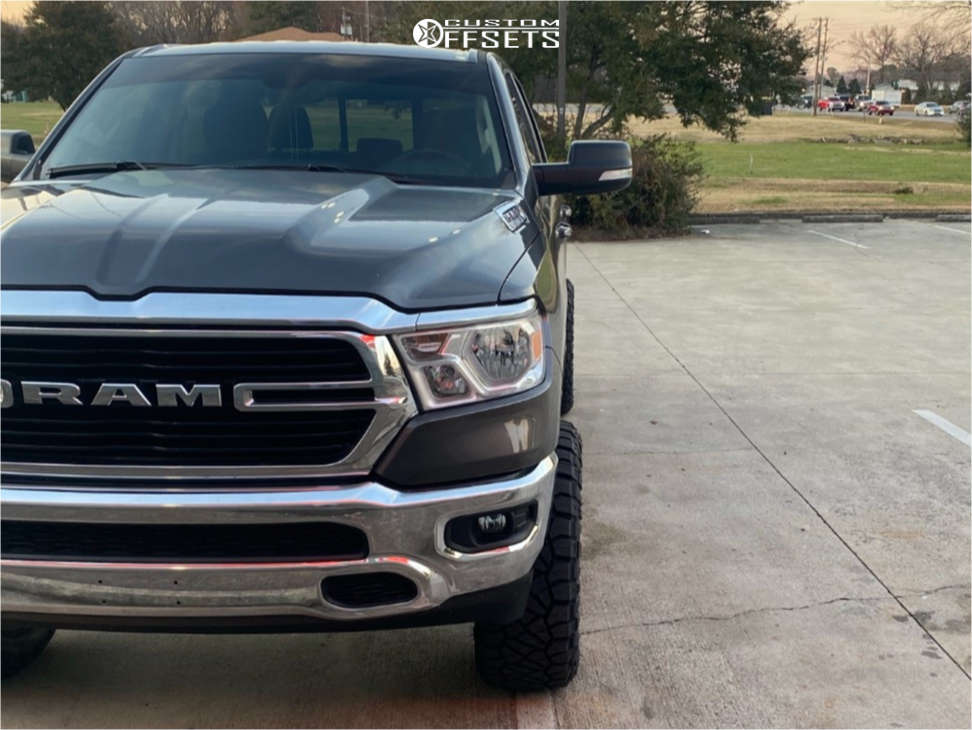 2020 Ram 1500 with 20x10 -18 Fuel Rebel and 35/12.5R20 Nitto Ridge ...
