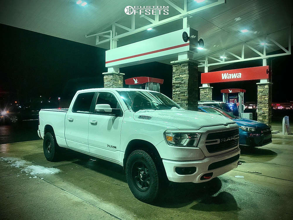 2019 Ram 1500 with 18x9 -12 Vision Split and 275/70R18 Falken WildPeak ...