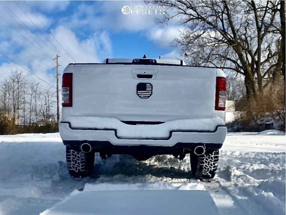 2019 Ram 1500 with 18x9 -12 Vision Split and 275/70R18 Falken WildPeak ...