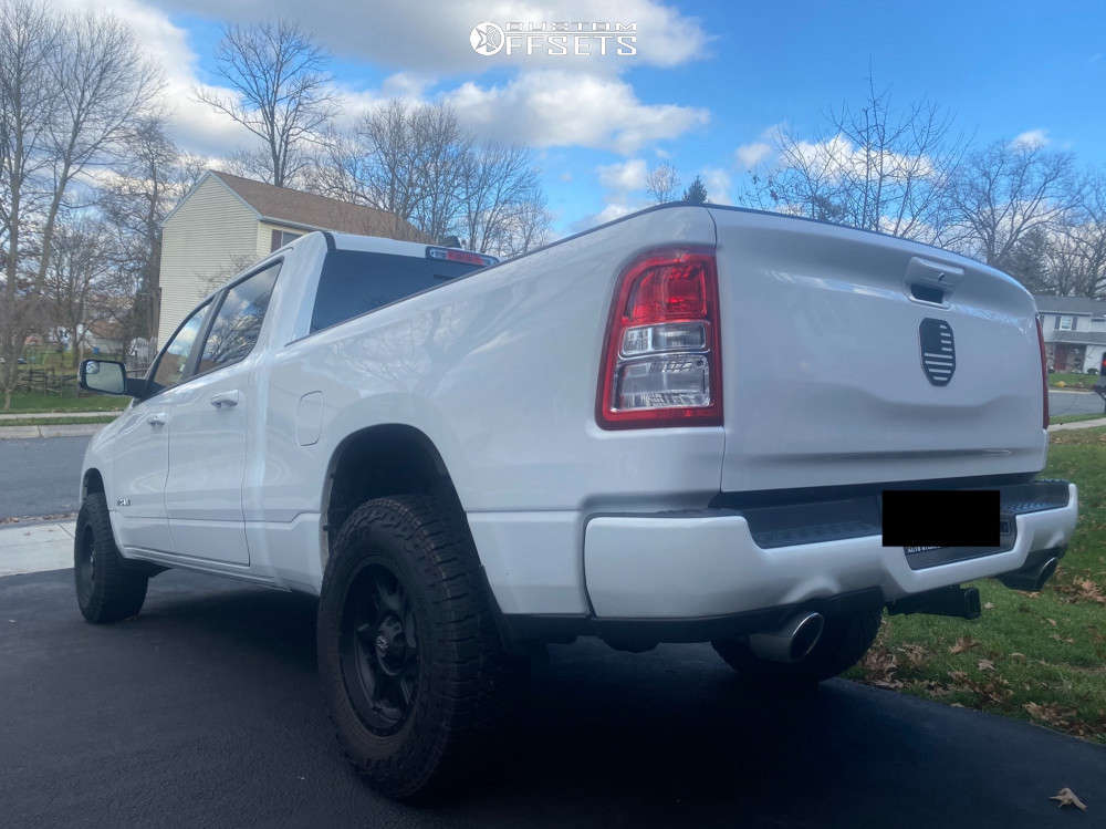 2019 Ram 1500 with 18x9 -12 Vision Split and 275/70R18 Falken WildPeak ...