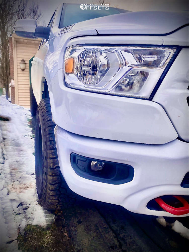 2019 Ram 1500 with 18x9 -12 Vision Split and 275/70R18 Falken WildPeak ...