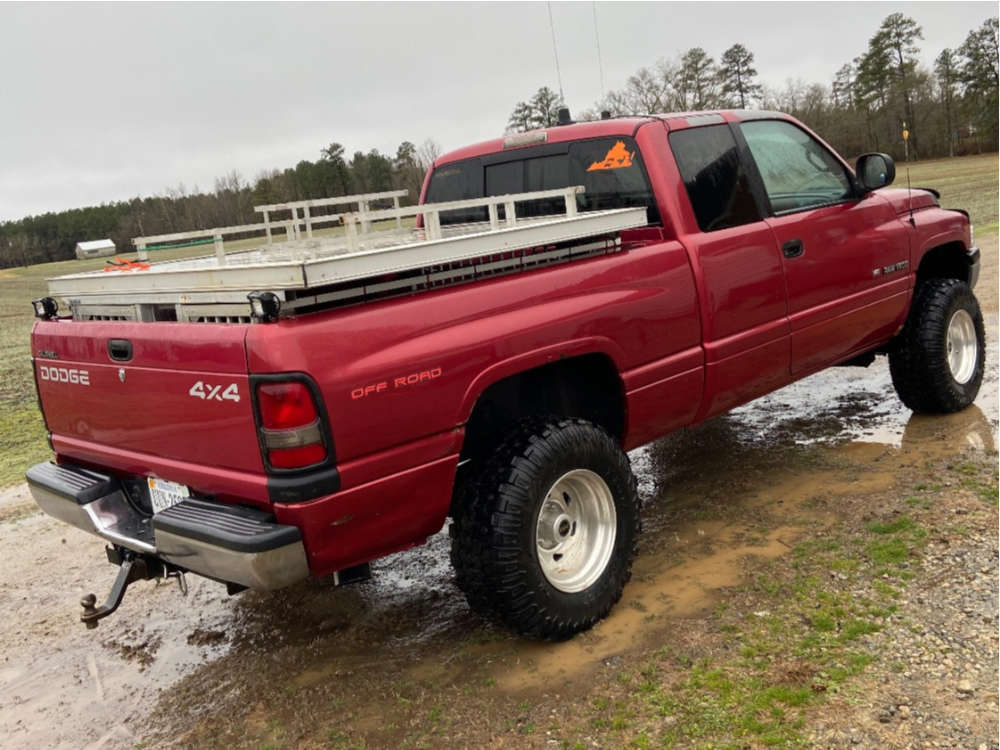 1998 Dodge Ram 1500 with 16.5x10 -0 Weld Racing Road Hawks and 33/12 ...
