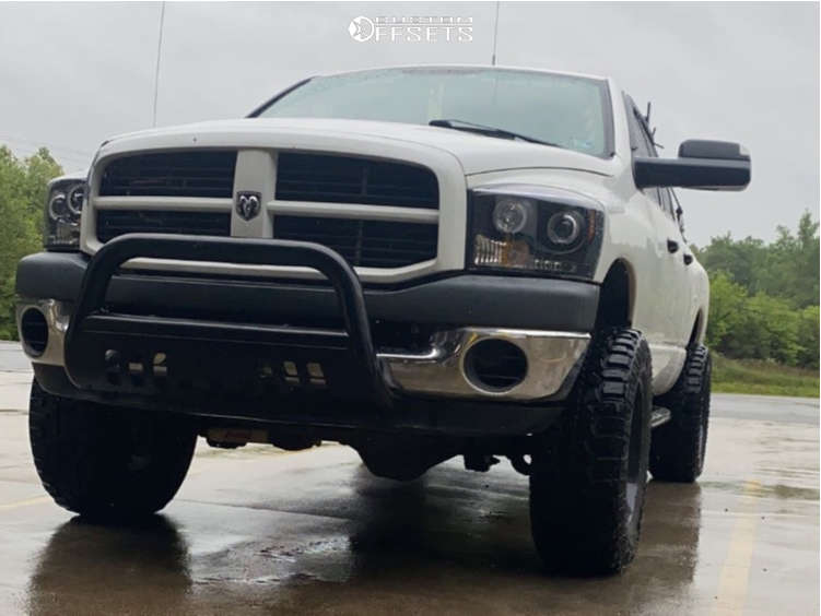 2008 Dodge Ram 2500 with 20x10 -25 Work Sentry and 35/12.5R20 Hercules ...