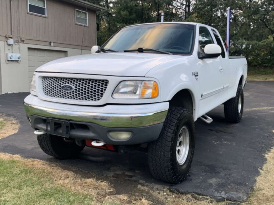 1999 Ford F-150 with 16x10 -25 Alloy Ion 171 and 35/11.5R16 Nitto Terra ...