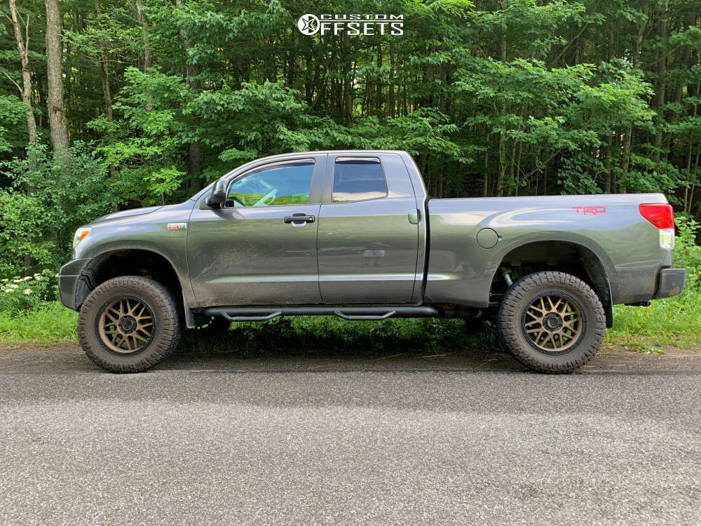 2011 Toyota Tundra with 20x9 18 XD Grenade and 35/12.5R20 Nitto Ridge Grappler and Suspension ...