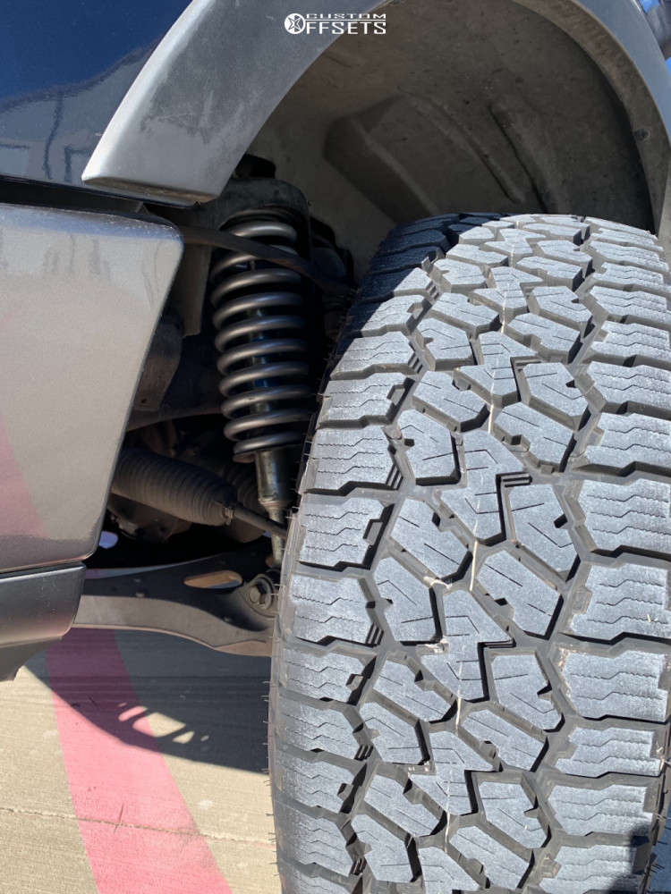 2004 Ford F-150 with 17x8.5 0 Method Mesh and 315/70R17 Falken WildPeak ...