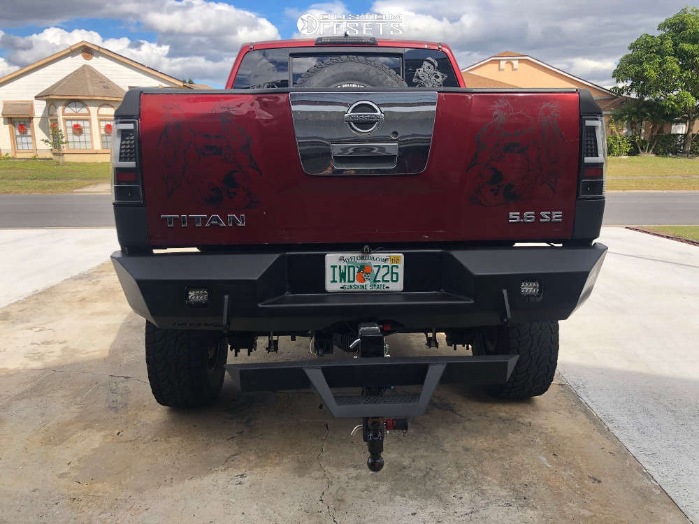 2009 Nissan Titan with 18x10 -24 Ballistic Scythe and 35/12.5R18 ...