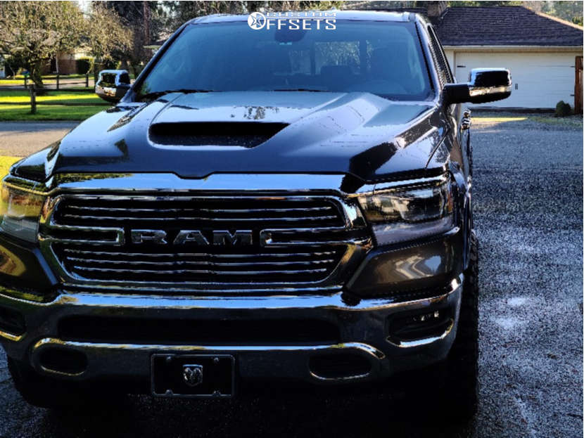 2019 Ram 1500 with 24x10 31 Strada Replicas Gm Snowflake Replica and 35 ...