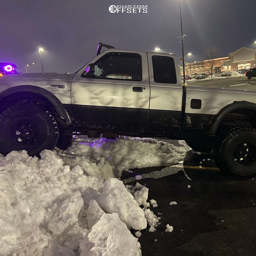 2002 Ford Ranger with 15x10 -47 Pro Comp 69 and 33/12.5R15 Dick Cepek ...