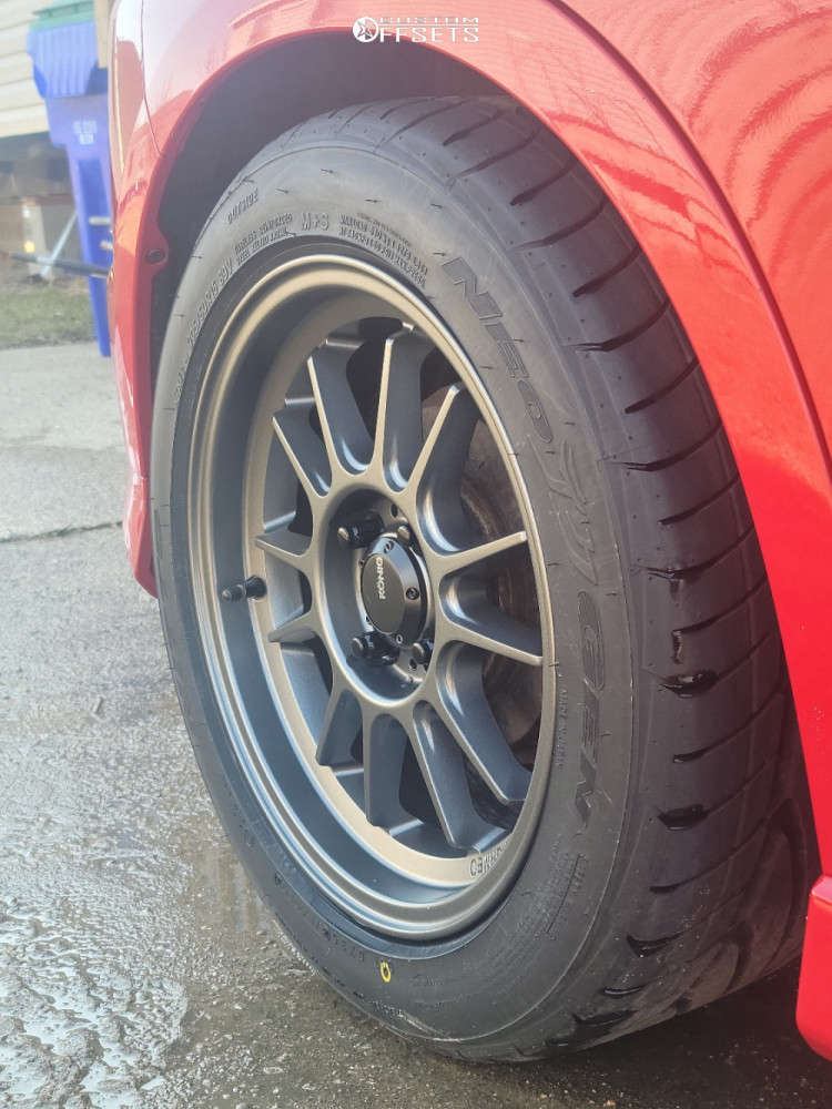 2011 Honda Fit with 15x7.5 35 Konig Hypergram and 205/50R15 Nitto Neo ...