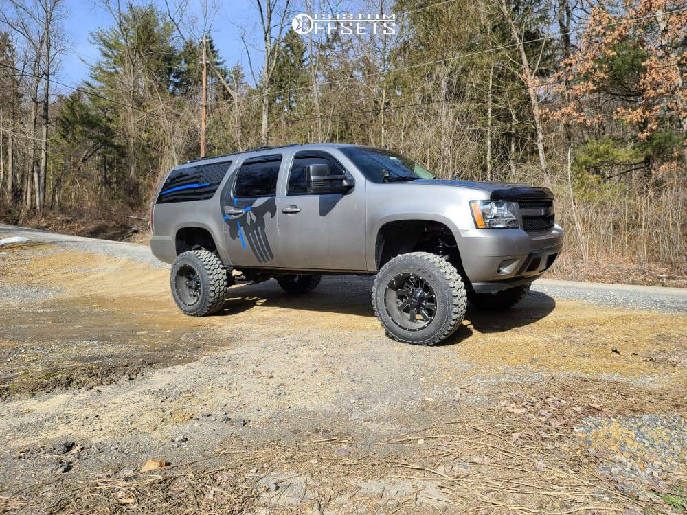 2009 Chevrolet Suburban 1500 with 20x12 -44 Savage Offroad Sa18 and 35/ ...