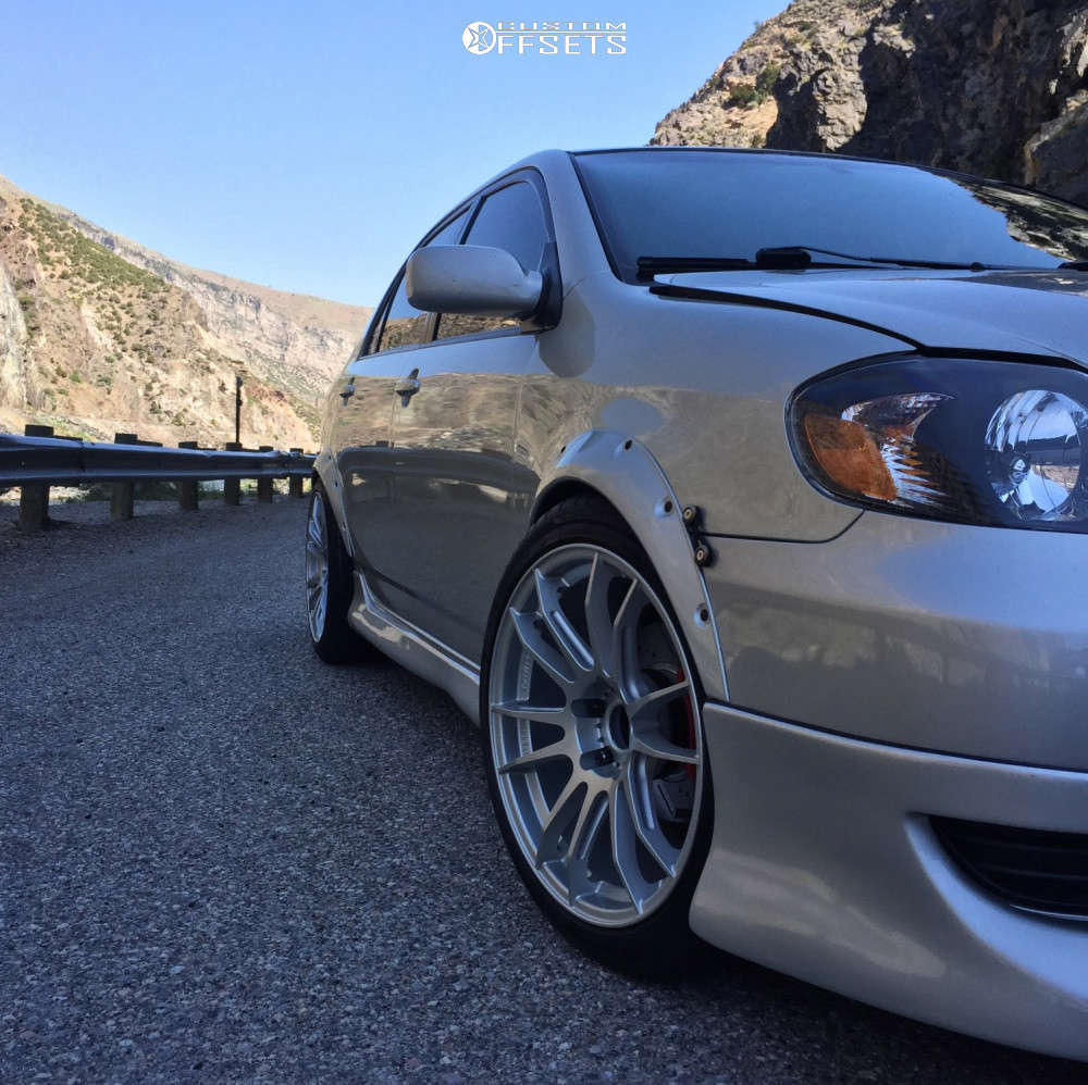 2003 Toyota Corolla with 18x9.5 35 Konig Torch and 235/40R18 Nitto ...