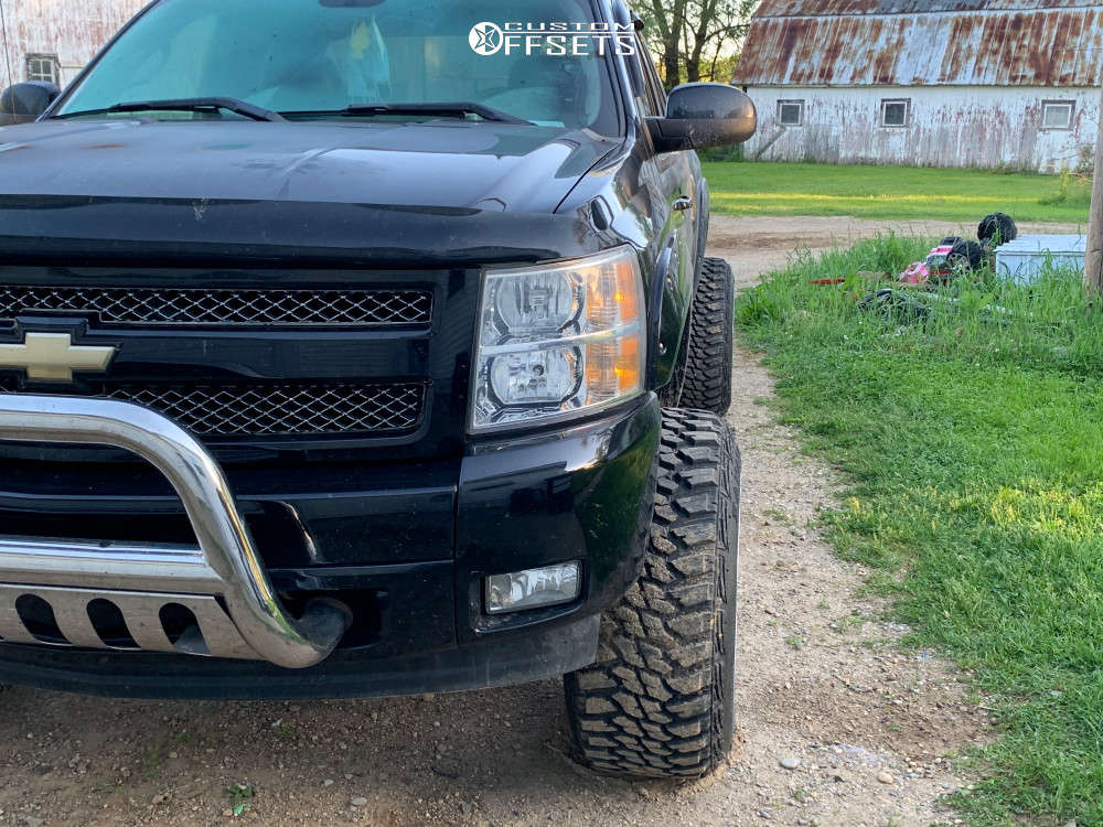 2011 Chevrolet Silverado 1500 with 22x14 -76 Hostile Rage and 35/12 ...