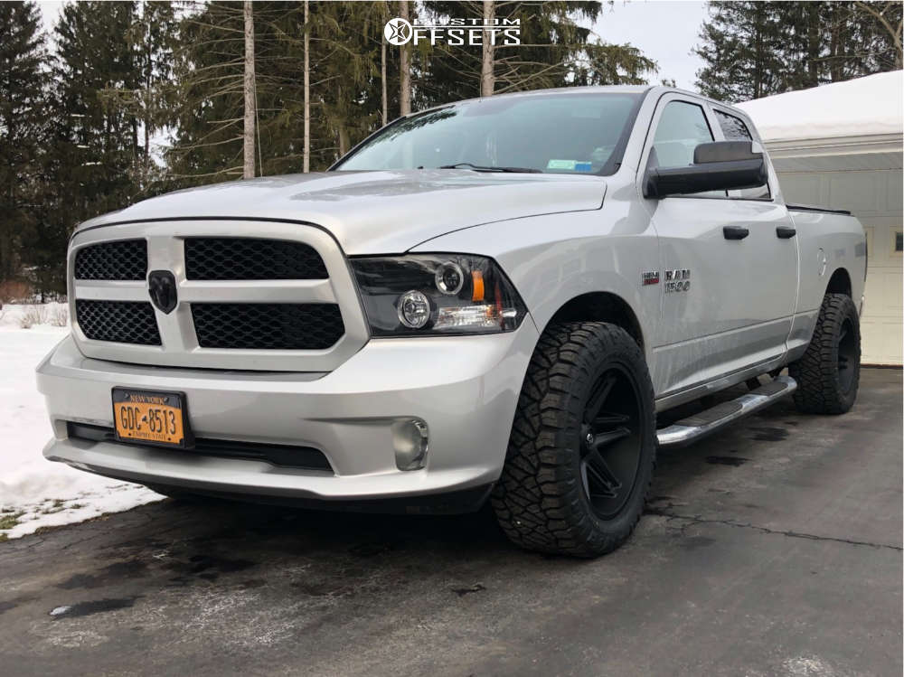 2015 Ram 1500 with 20x10 -25 Vision Razor and 33/12.5R20 Nitto Ridge ...