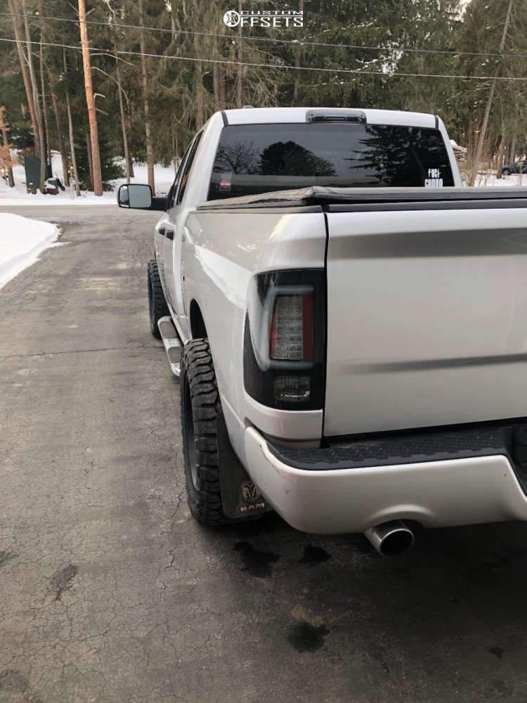 2015 Ram 1500 with 20x10 -25 Vision Razor and 33/12.5R20 Nitto Ridge ...