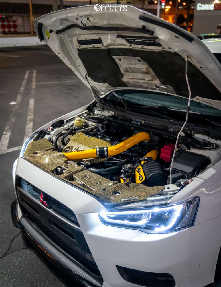 2012 Mitsubishi Lancer with 18x10.5 15 Volk Ce28sl and 275/35R18 Nitto ...