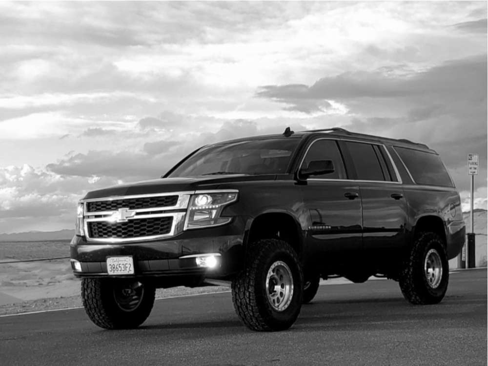 2015 Chevrolet Suburban with 17x9 -12 Method Mr315 and 35/12.5R17 Toyo ...