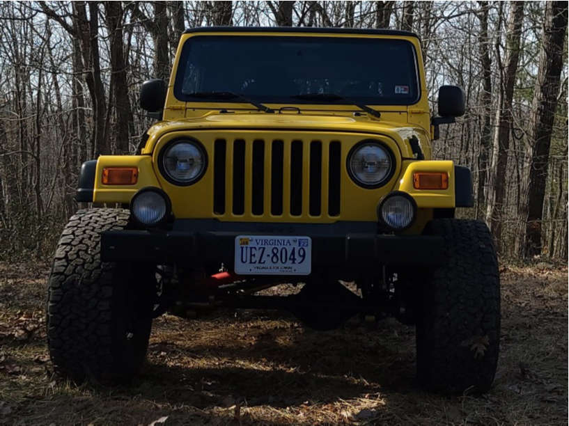 2001 Jeep TJ with 15x10 -24 Pro Comp 51 and 33/12.5R15 BFGoodrich All ...