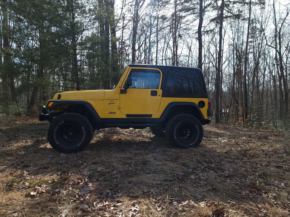 2001 Jeep TJ with 15x10 -24 Pro Comp 51 and 33/12.5R15 BFGoodrich All ...
