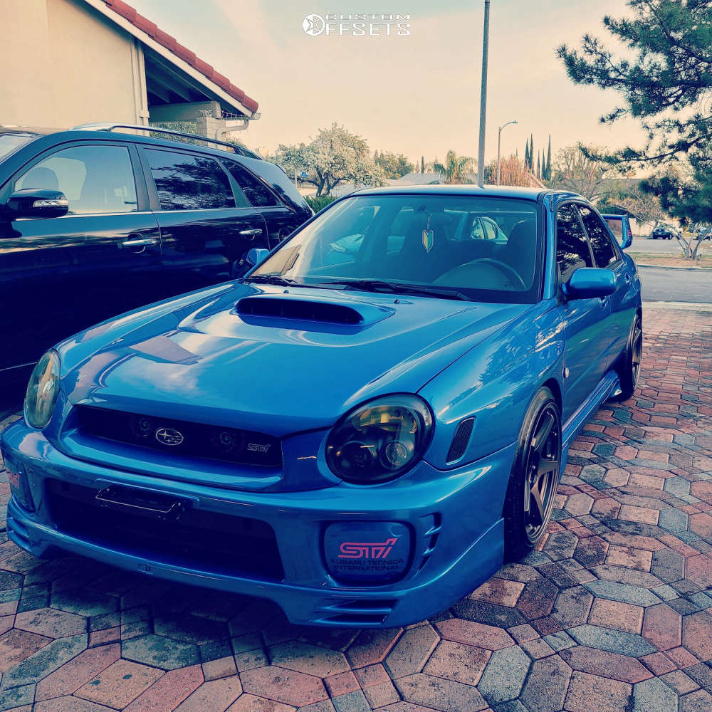 2002 Subaru WRX STI with 18x9.5 45 Enkei Ts-5 and 225/40R18 Nitto Neo ...