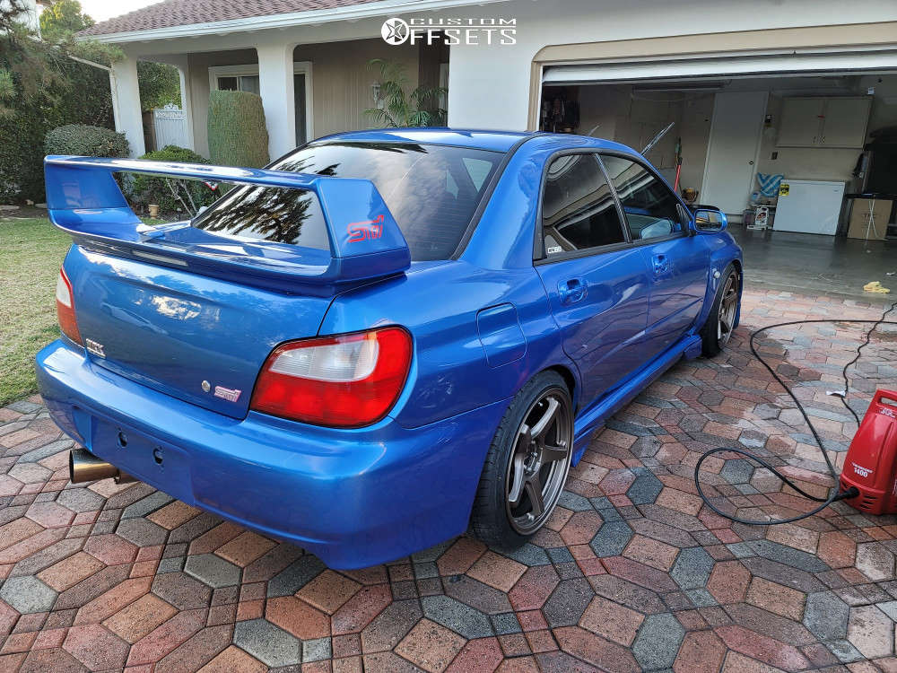 2002 Subaru WRX STI with 18x9.5 45 Enkei Ts-5 and 225/40R18 Nitto Neo ...