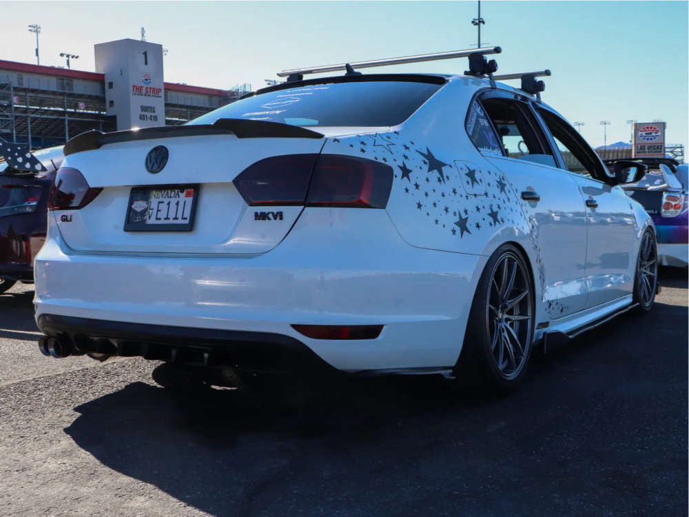 2014 Volkswagen Jetta with 18x8 45 Konig Oversteer and 225/40R18 ...