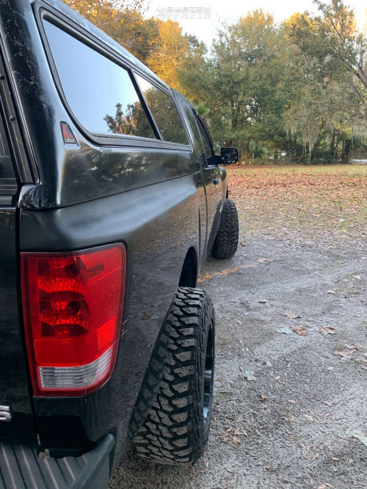 2005 Nissan Titan with 20x12 -51 Vision Prowler and 35/12.5R20 Kanati ...