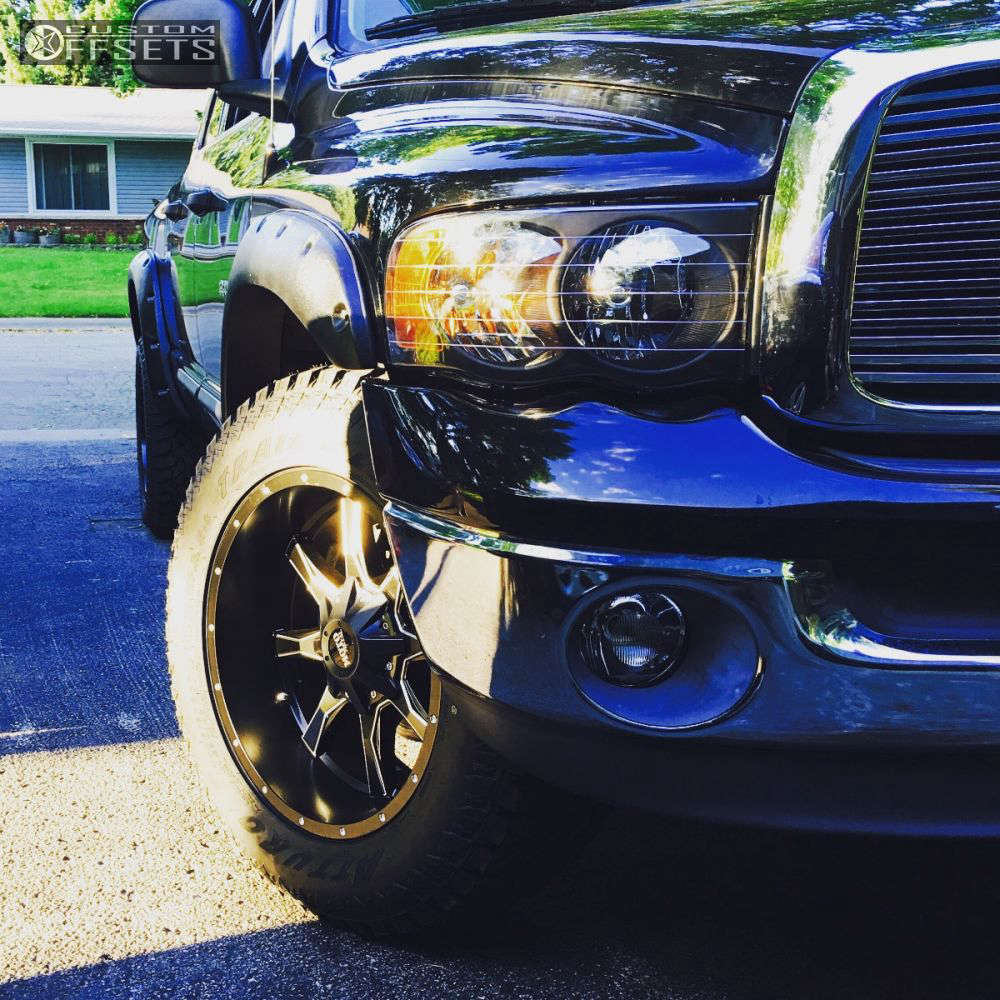 2002 Dodge Ram 1500 with 20x10 -24 Moto Metal MO970 and 295/60R20 ...