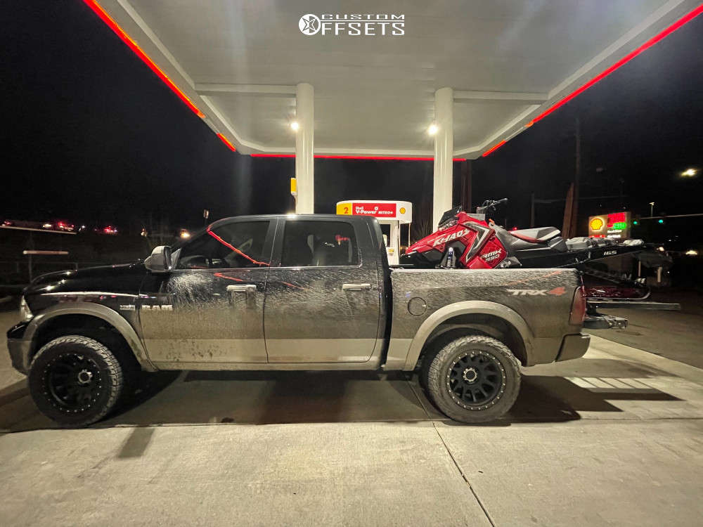 2010 Dodge Ram 1500 with 20x10 -24 Method Nv and 305/55R20 Falken ...