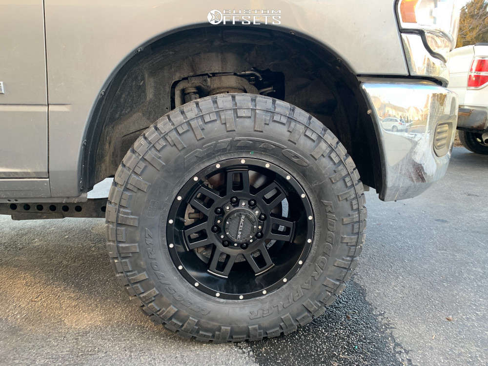 2020 Ram 2500 with 17x9 -12 Raceline Injector and 305/70R17 Nitto Ridge ...