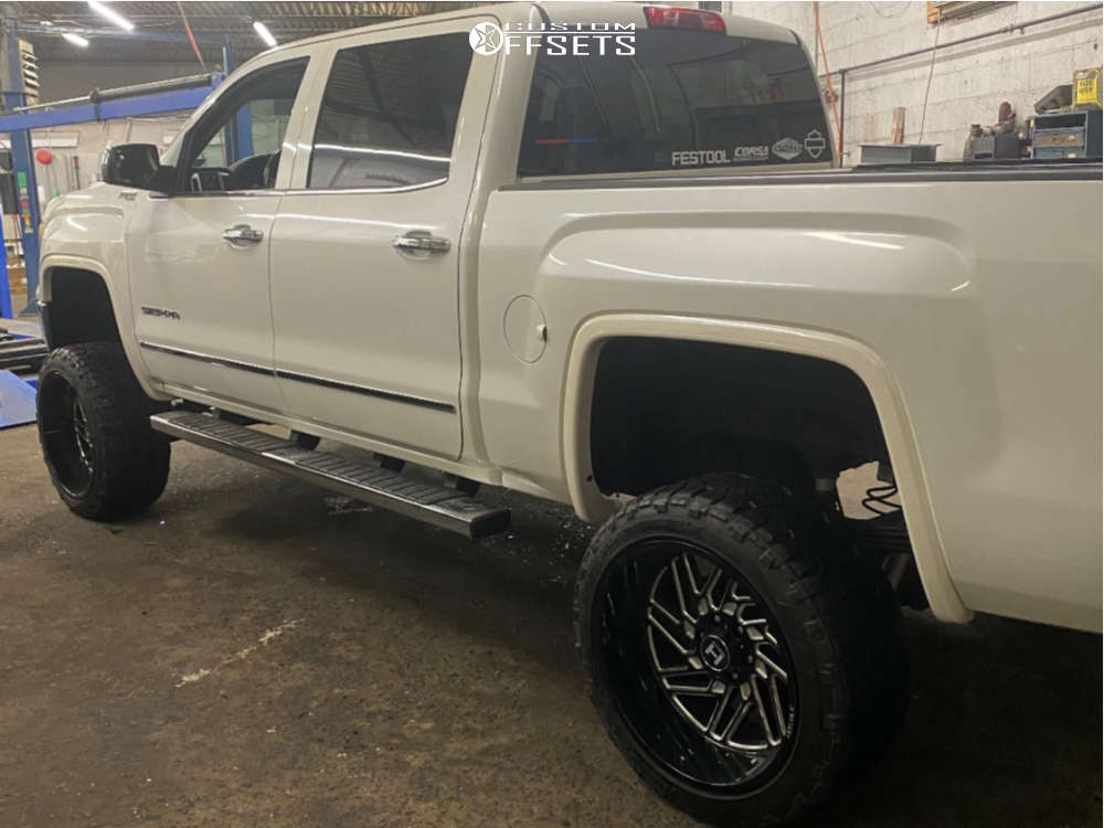 2014 GMC Sierra 1500 with 22x12 -44 Hostile Jigsaw and 33/12.5R22 Nitto Ridge Grappler and ...