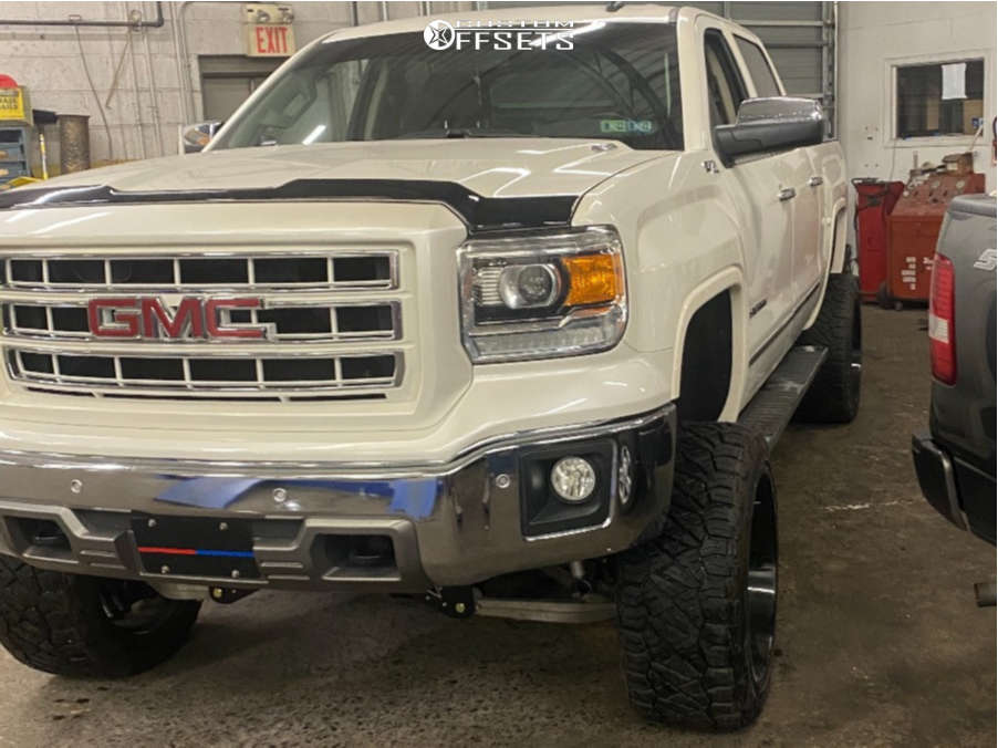 2014 GMC Sierra 1500 with 22x12 -44 Hostile Jigsaw and 33/12.5R22 Nitto Ridge Grappler and ...