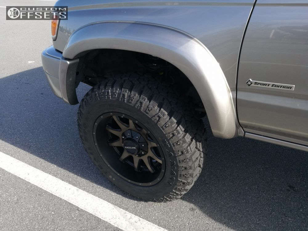 2002 Toyota 4Runner with 18x9 -12 Raceline Shift and 275/65R18 Kanati ...