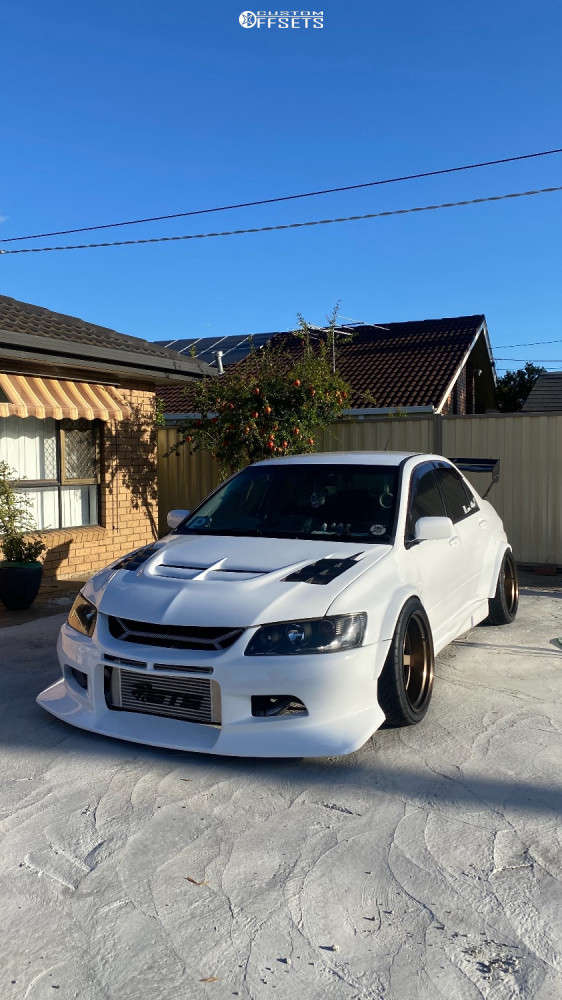 2003 Mitsubishi Lancer with 18x12 -33 Volk Te37v Mark Ii and 295/30R18 ...