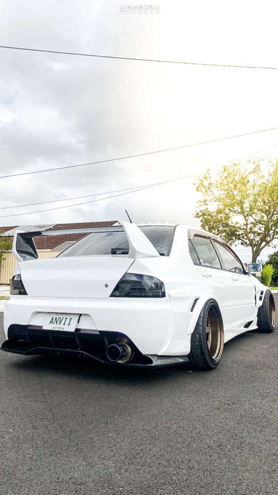 2003 Mitsubishi Lancer with 18x12 -33 Volk Te37v Mark Ii and 295/30R18 ...