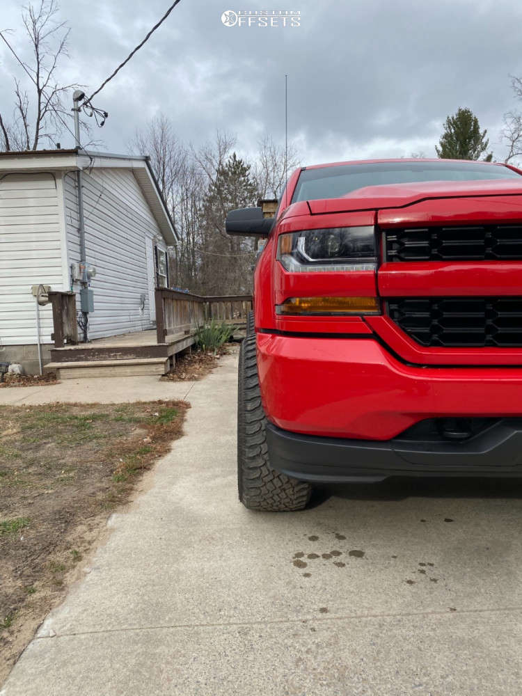 2016 Chevrolet Silverado 1500 with 22x12 -44 Hostile Sprocket and 305/45R22 Atturo Trail Blade ...