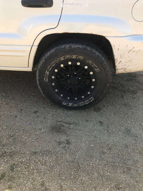 2004 Jeep Grand Cherokee with 16x8 0 Pro Comp 31 and 295/70R16 Cooper ...