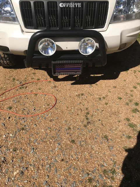 2004 Jeep Grand Cherokee with 16x8 0 Pro Comp 31 and 295/70R16 Cooper ...