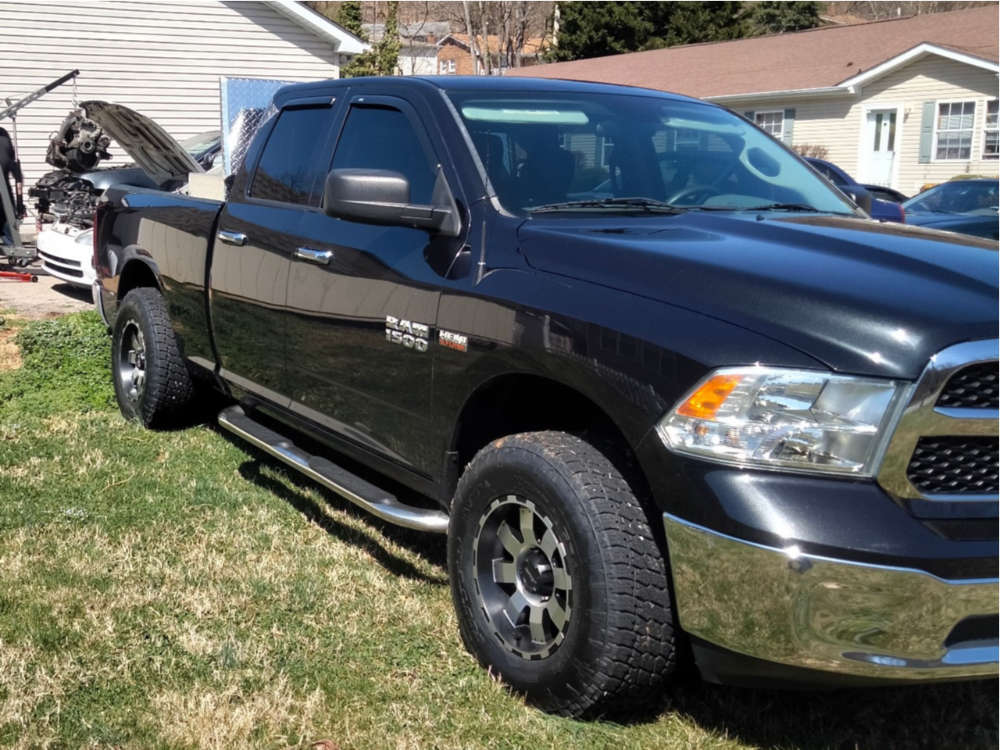 2017 Ram 1500 with 17x9 -12 Impact Destroyer and 33/12.5R17 Nitto Terra ...
