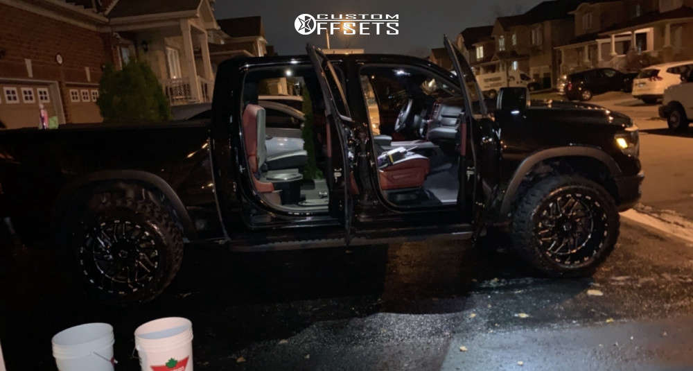 2019 Ram 1500 with 22x12 -44 TIS 544BM and 35/12.5R22 Nexen Roadian Mtx ...