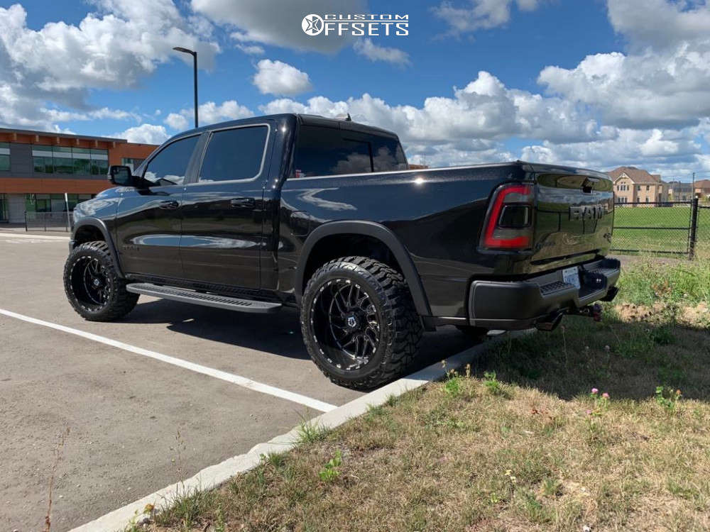 2019 Ram 1500 with 22x12 -44 TIS 544BM and 35/12.5R22 Nexen Roadian Mtx ...