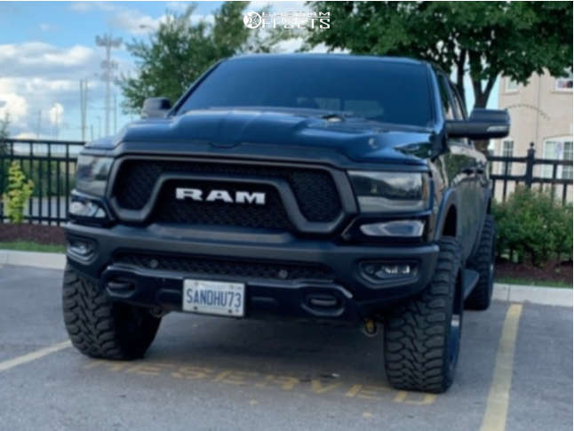 2019 Ram 1500 with 22x12 -44 TIS 544BM and 35/12.5R22 Nexen Roadian Mtx ...