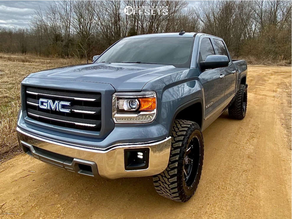 2015 GMC Sierra 1500 with 20x10 -19 Hostile Alpha and 33/12.5R20 Atturo ...