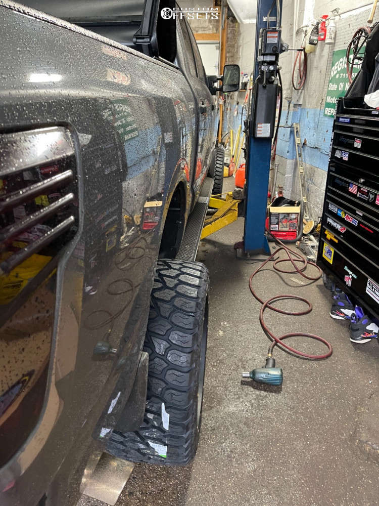 2017 Nissan Titan XD with 22x12 -51 Vision Rocker 412 and 33/12.5R22 ...